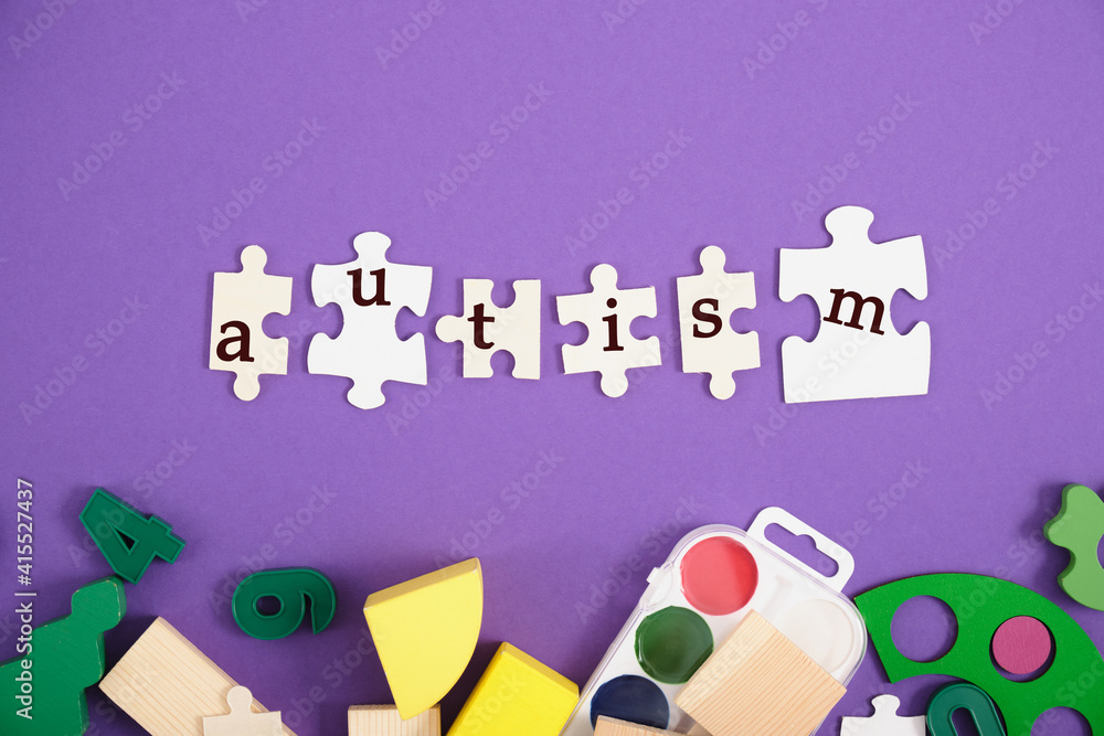 inscription autism on plasmas, purple background, copy space ...