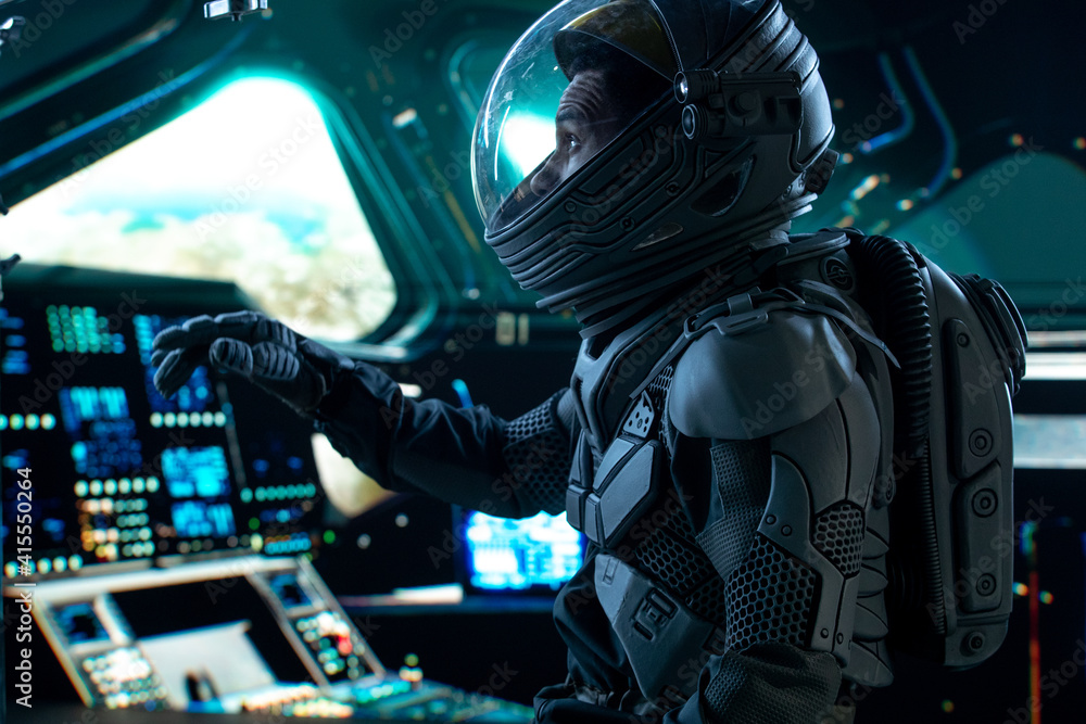 Portrait of African American Black male astronaut inside spaceship ...