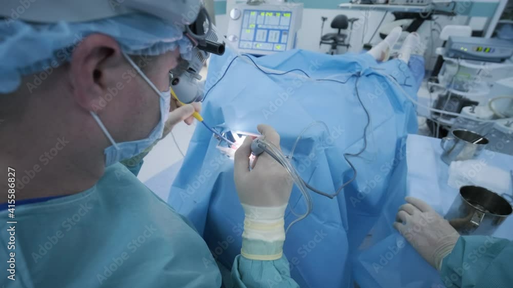 Operation of removing tonsils. tonsillectomy under deep anesthesia ...