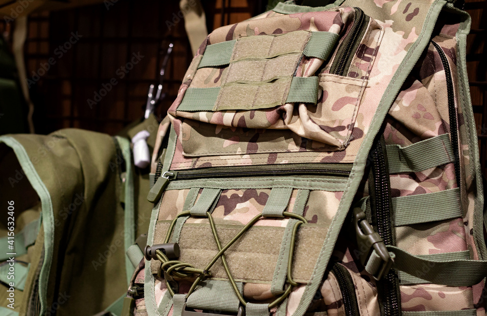 Close-up photo of tactical camouflaged military soldier backpack ...
