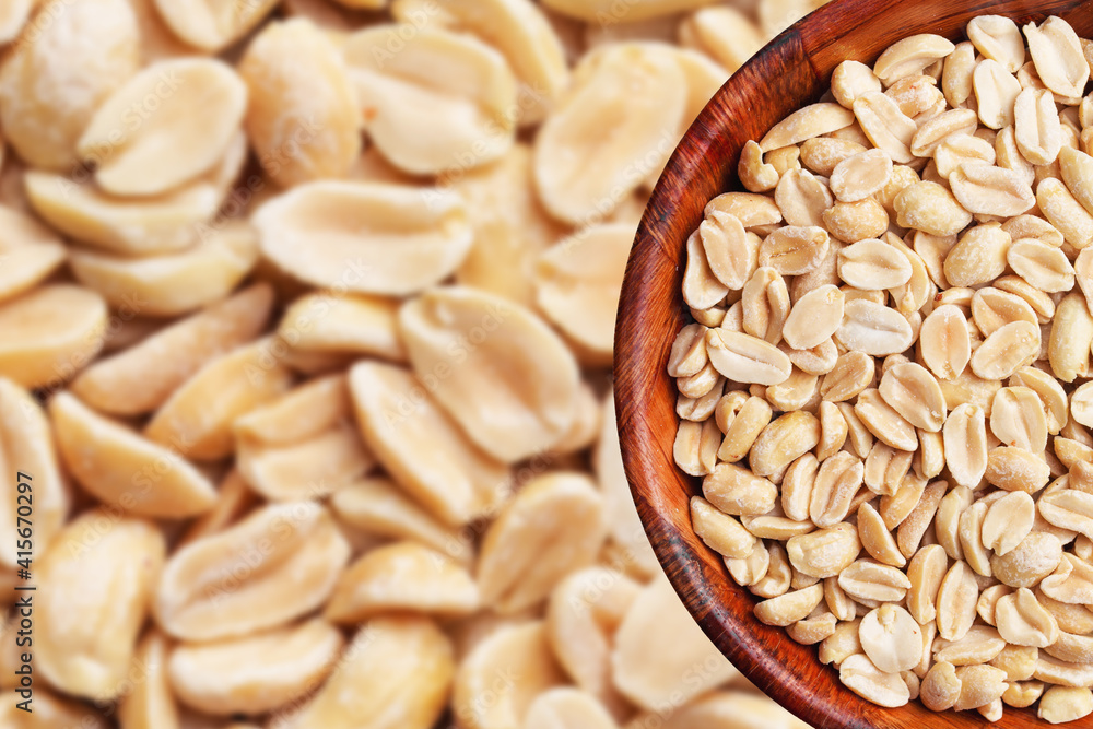 Peanuts in wooden bowl isolated. No shell nuts texture. Peeled peanuts ...