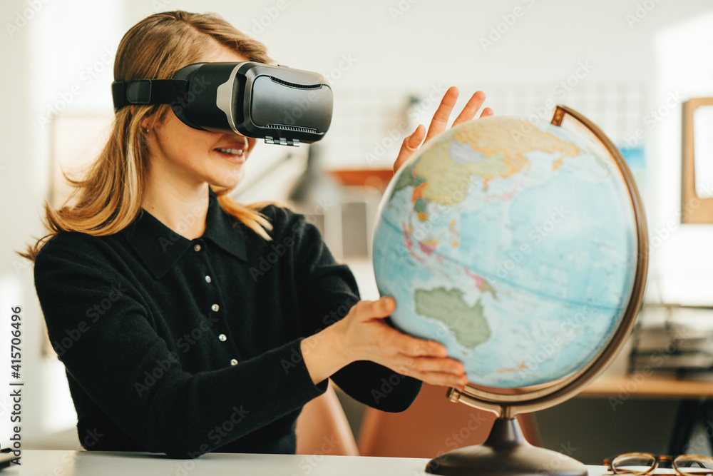 Pretty woman using vr headset and world map has virtual travel to any ...