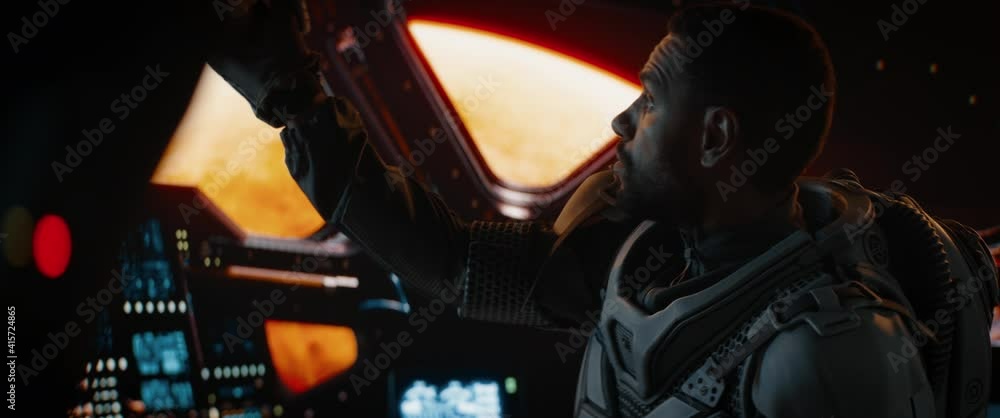 Portrait of African American Black male astronaut adjusting controls ...