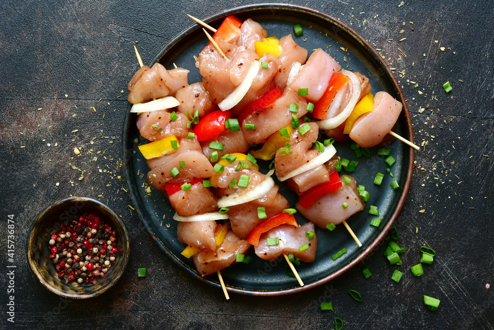 Raw chicken kebab with ingredients for marinating. Top view with copy ...