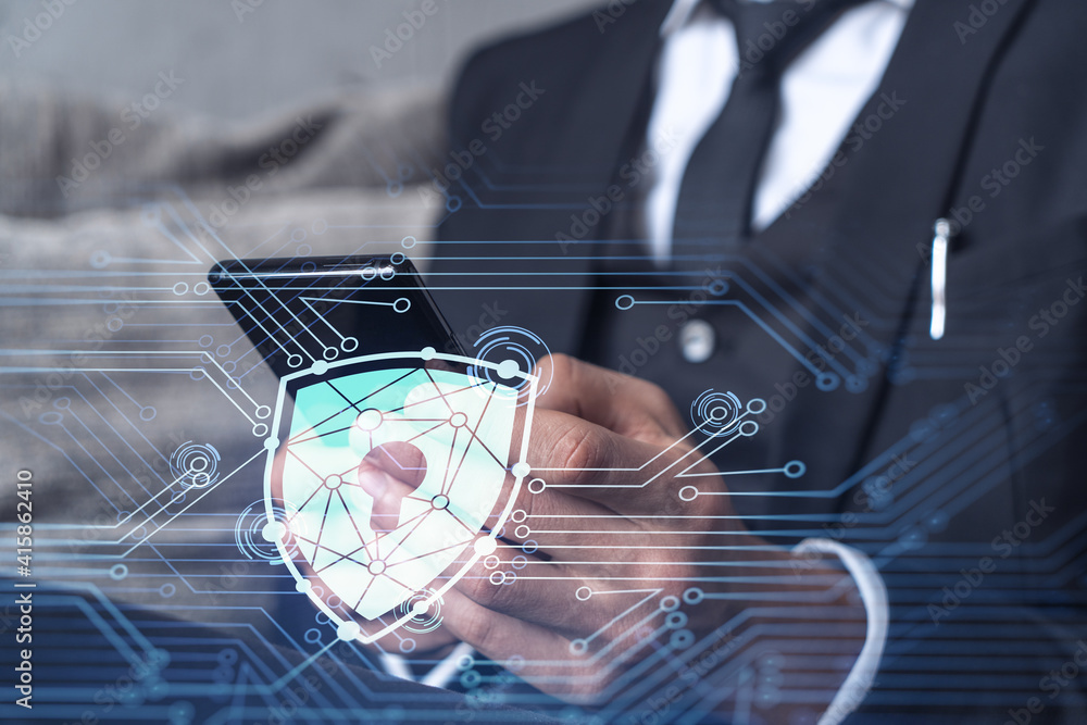 Foto Stock A programmer is browsing the Internet in smart phone to ...