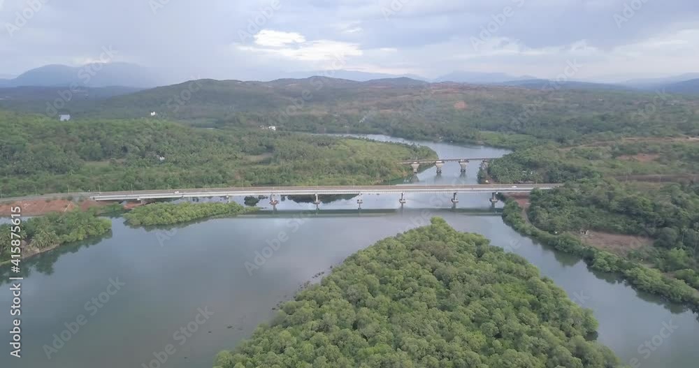 Drone Fly Towards New Highway Bridge Over Talpona River With Forested ...