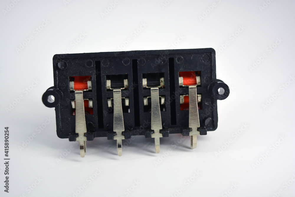 Black electric plastic box for fixing wires with red and black clamps ...