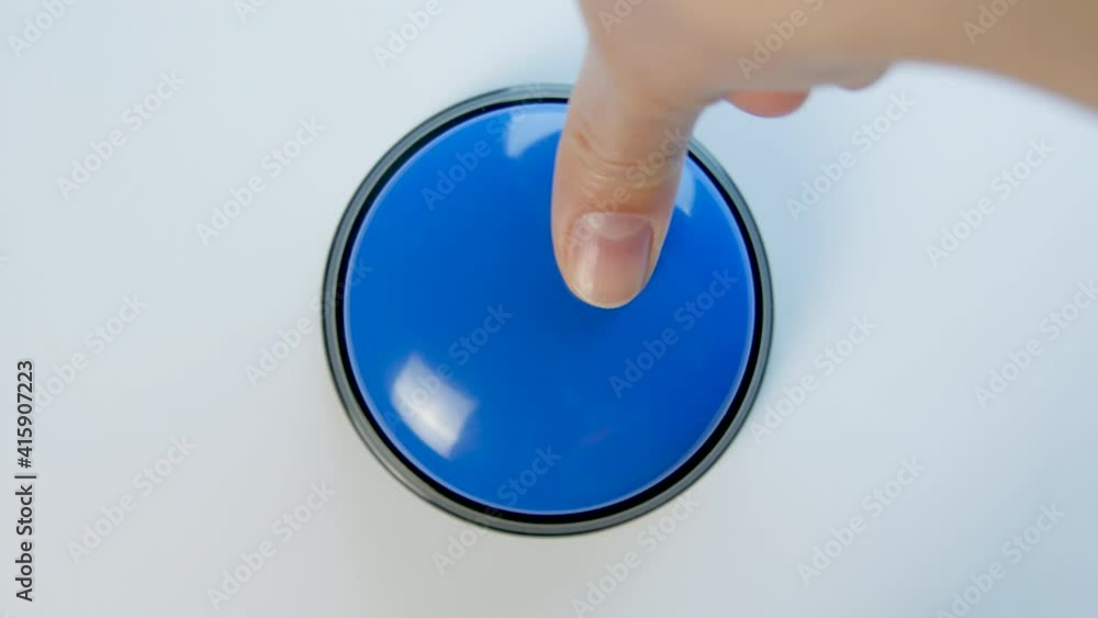 Young woman pushing blue button with a finger and palm of her hand ...