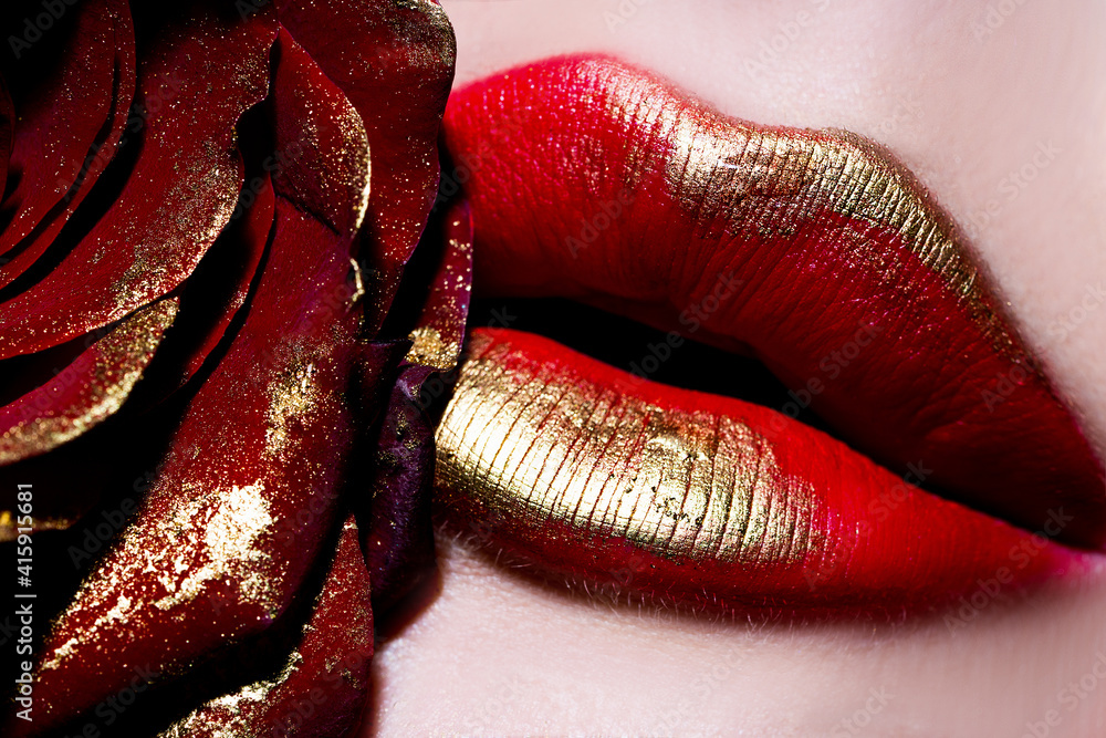 Beautiful red lips with red gold rose close-up. Classic red lips with ...