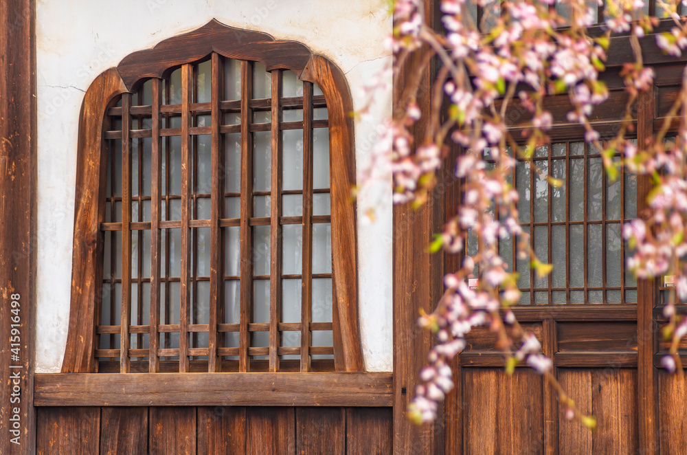 Traditional Kamakura era flame-shaped katomado style wooden window on ...