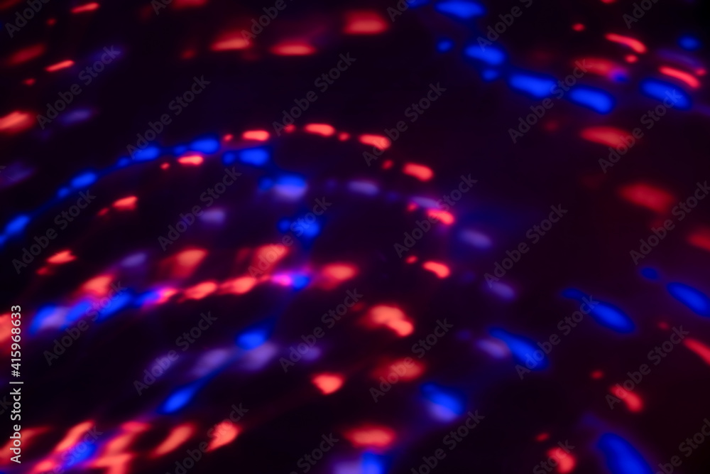 Blur colorful neon light leaks on black background. Defocused ...