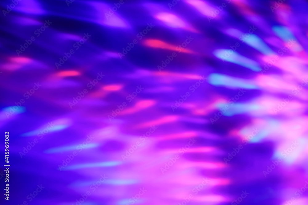Blur colorful neon light leaks on black background. Defocused ...