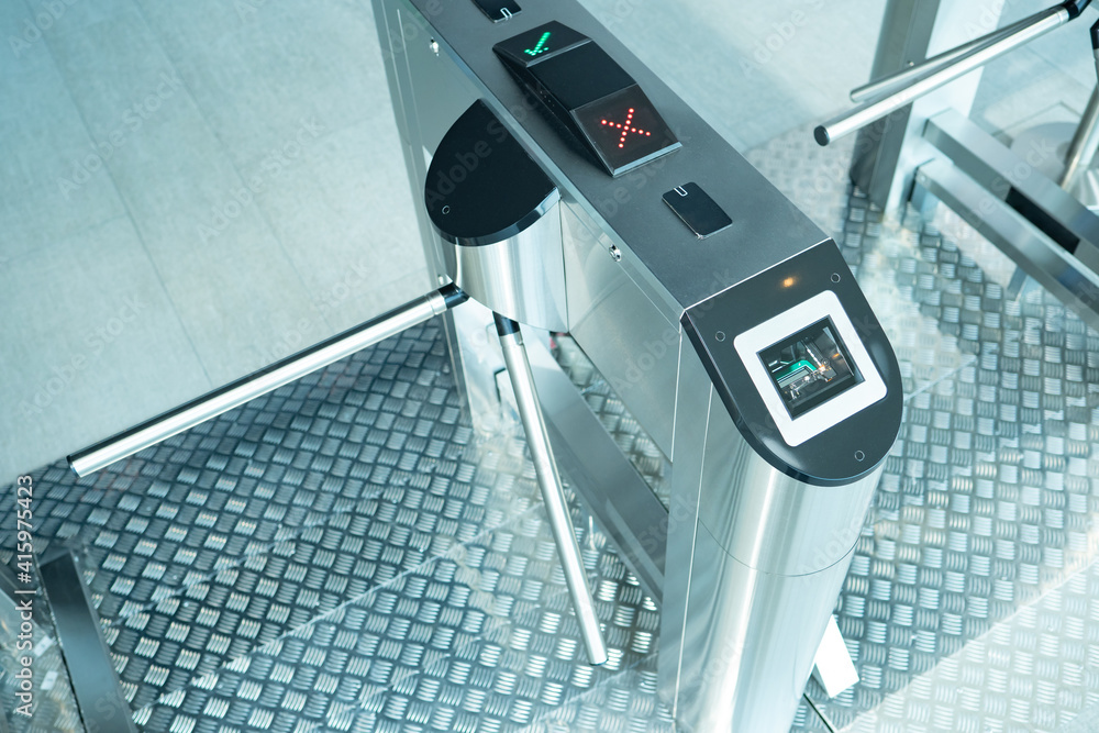 Cross on the turnstile as a symbol of restriction of movement. Indoor ...