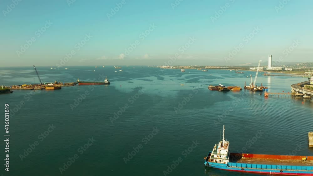 Seaport with cranes and harbor with cargo ships, Cebu City, Philippines ...