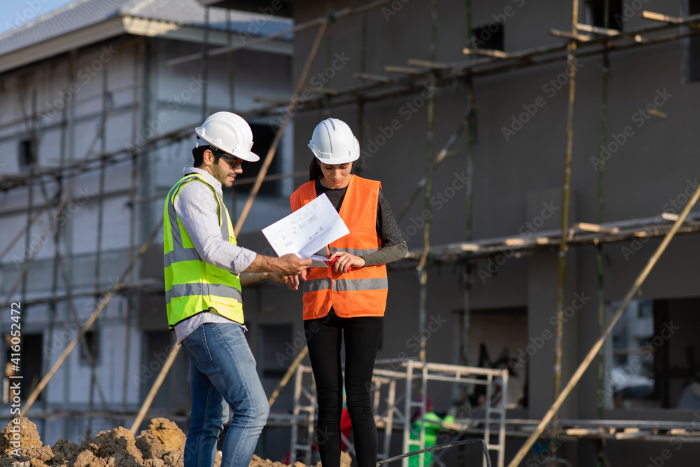 Professional Mechanical Engineer team Working on construction site ...