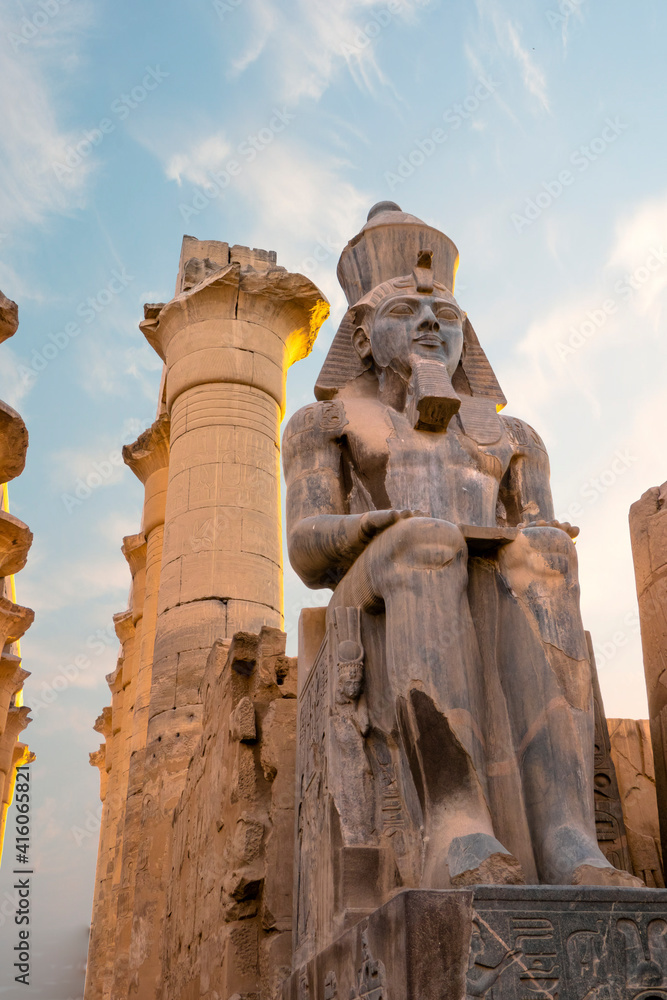 THE HUGE STATUE OF RAMESSES II IN LUXOR TEMPLE, EGYPT A LARGE ANCIENT ...