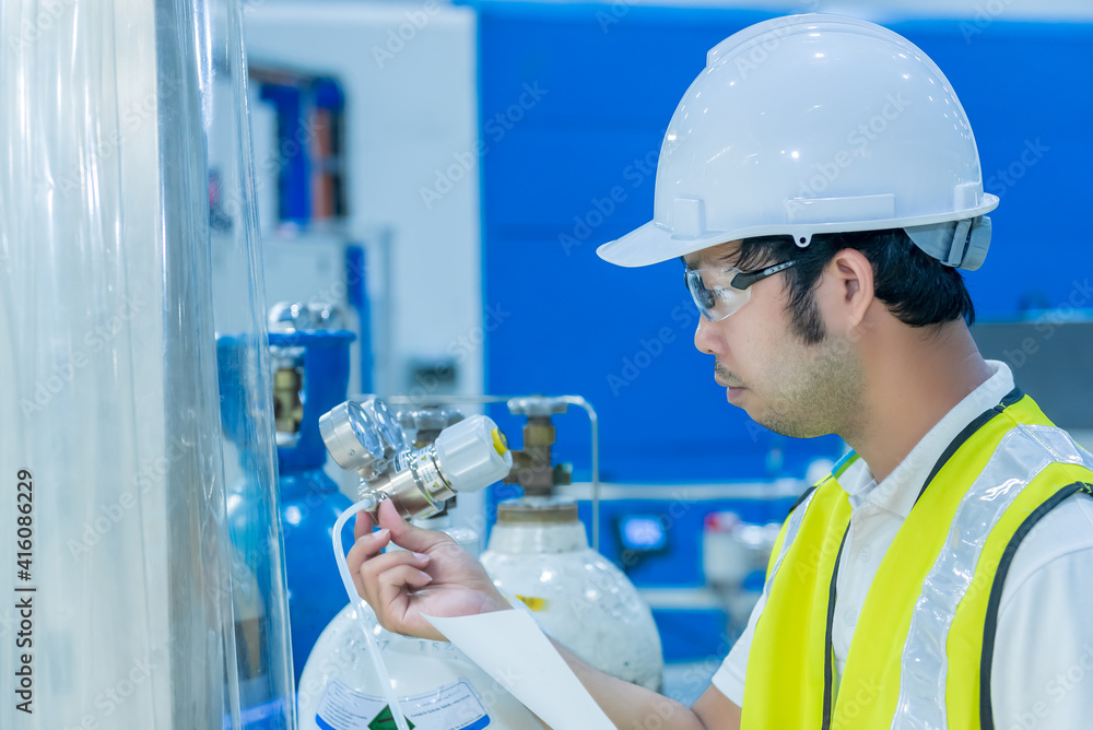 Asian engineer working at Operating hall,Thailand people wear helmet ...