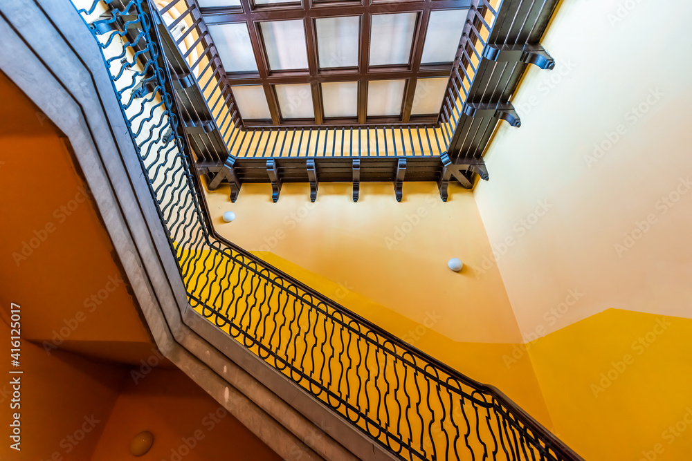 View of old vintage staircase with yellow color in Warsaw, Europe ...
