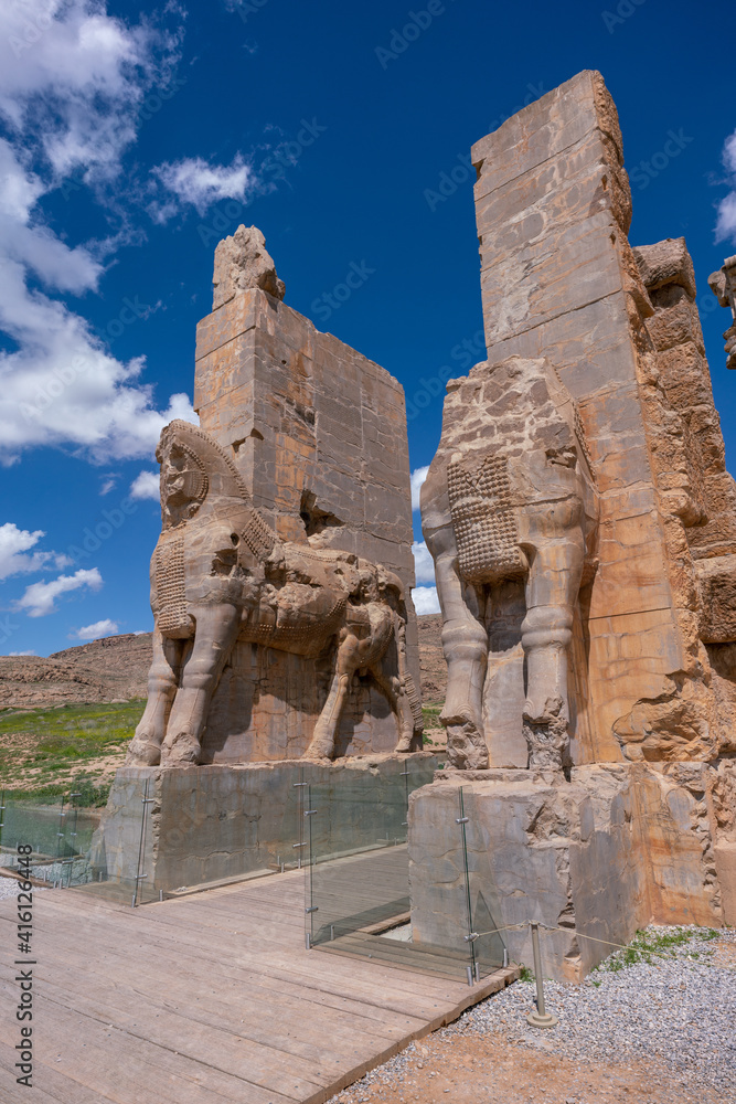 Ruins, statues and murals of ancient persian city of Persepolis in Iran ...