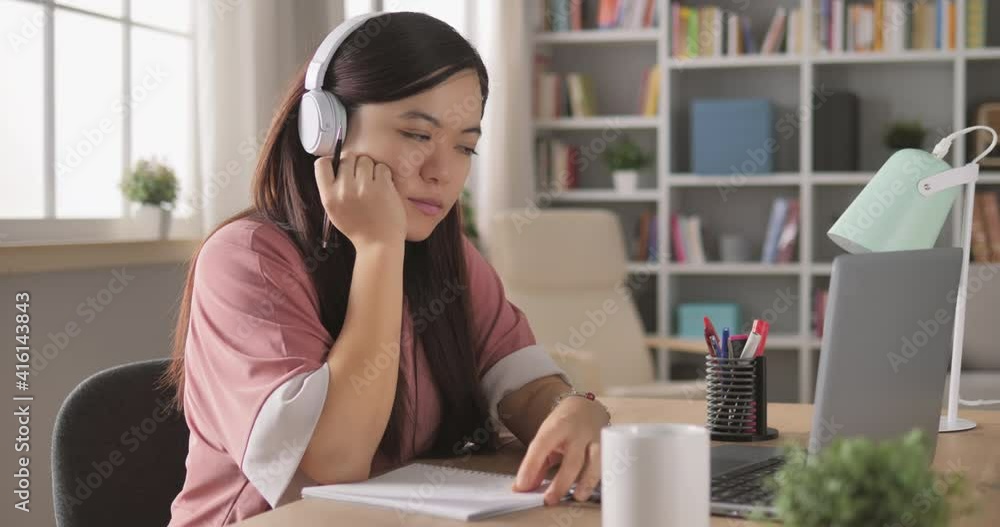 chinese girl student studying online watching internet video class ...