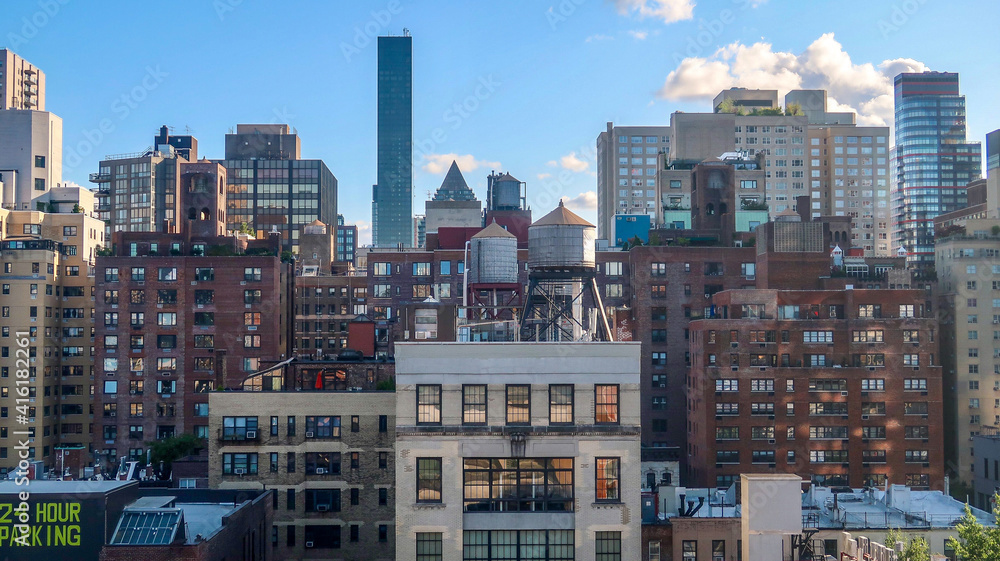 Strong skyline created by masonry building roof edges in narrow street ...