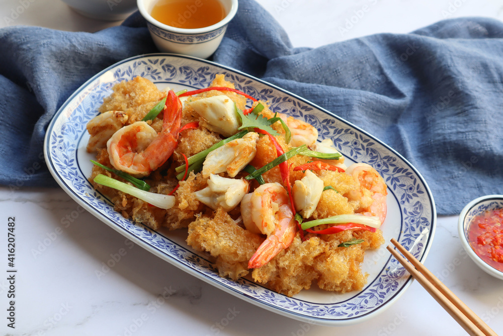 Stir fried Fish Maw with crabmeat and prawn - close up view on marble ...