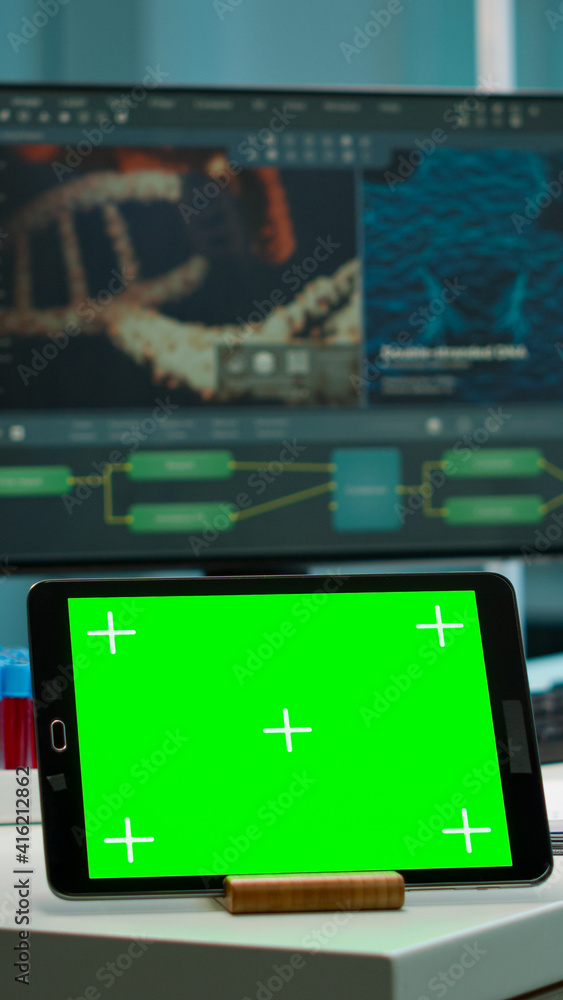 Display tablet with green screen, mock up on template placed on desk in ...