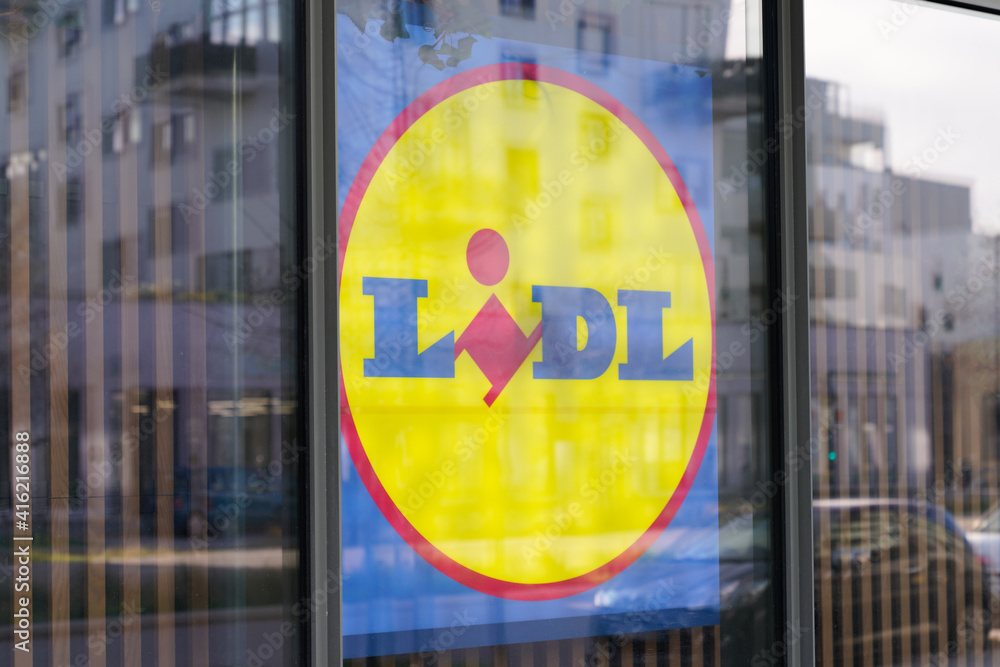 Lidl sign text and logo round brand of store front hard discount ...