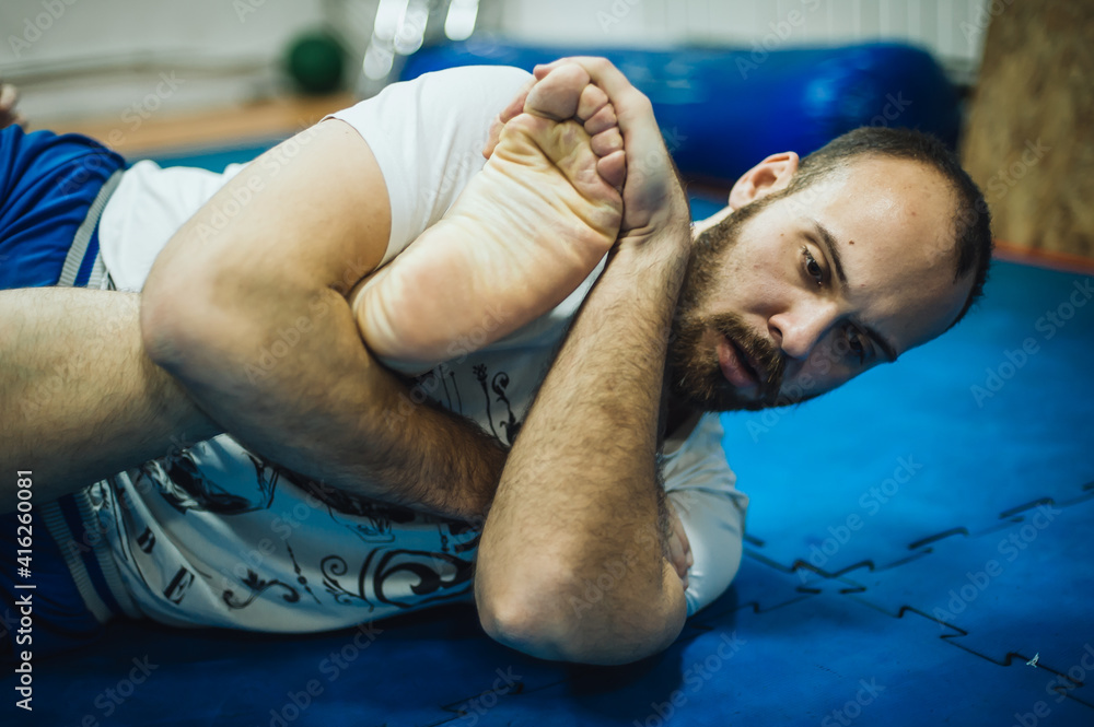 BJJ Brazilian jiu-jitsu ground fight training combat sparing. Leg ankle ...