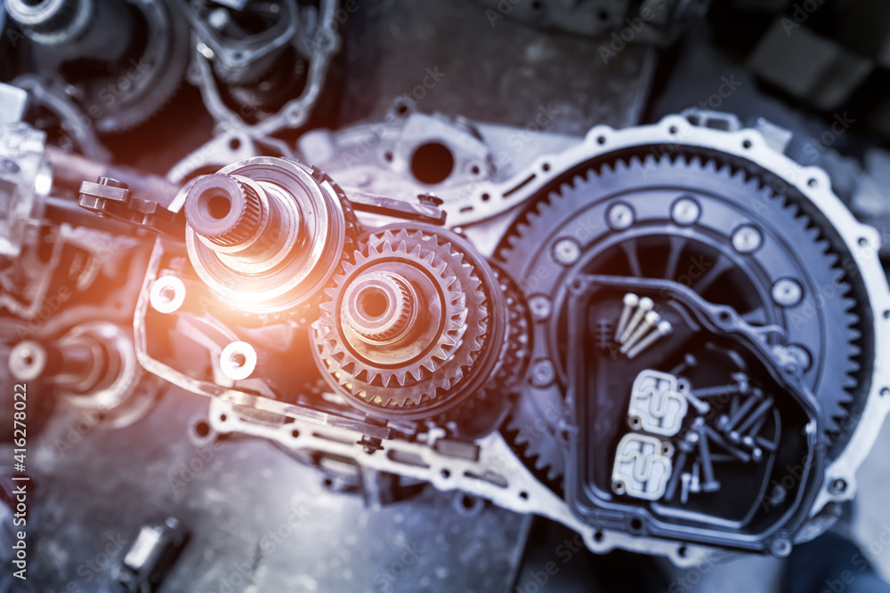 Closeup disassembled car automatic transmission gear part on workbench ...