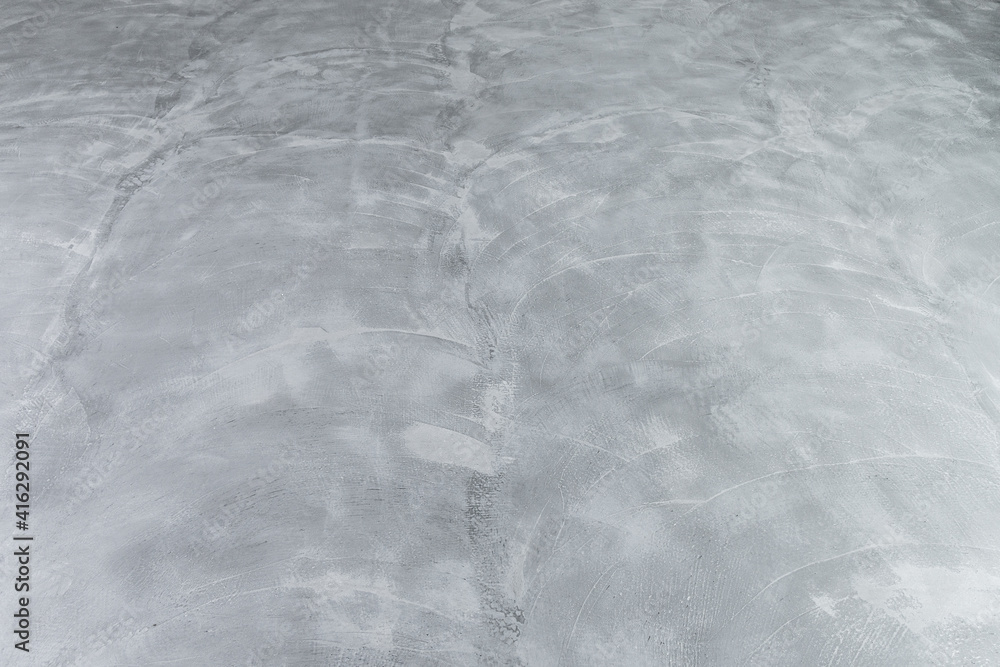 Background of Microcement grey floor with defects due to human errors ...