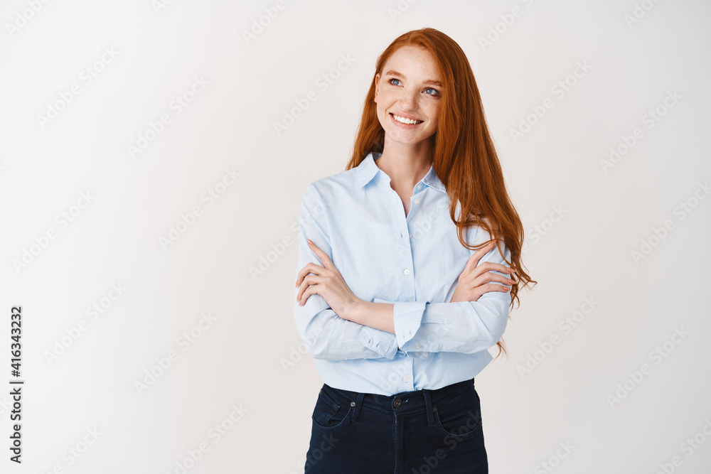 Professional people. Smiling girl student with ginger hair and blue ...