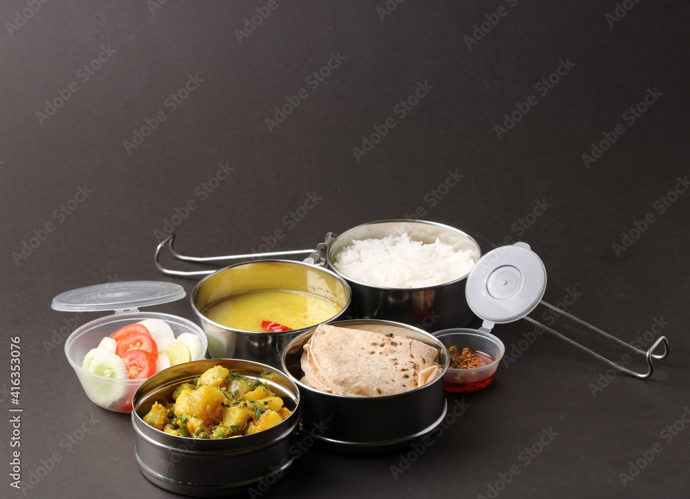 Typical Stainless steel Lunch Box or Tiffin with Maharashtrian food ...