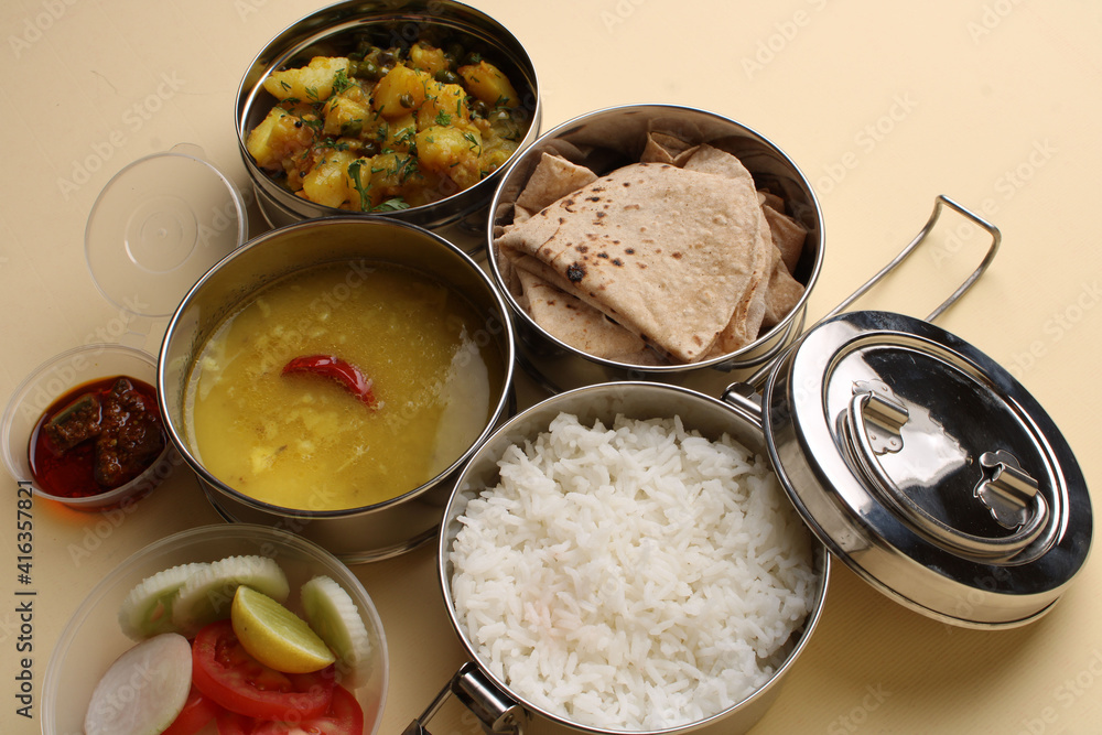 Typical Stainless steel Lunch Box or Tiffin with Maharashtrian food ...