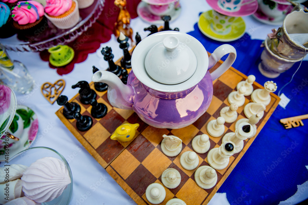 Holiday themed table for the tea ceremony. Table with sweets. Tea with ...