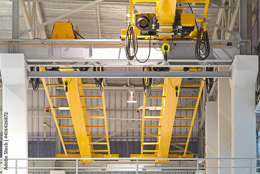 Foto de Overhead crane inside factory or warehouse. That industrial ...