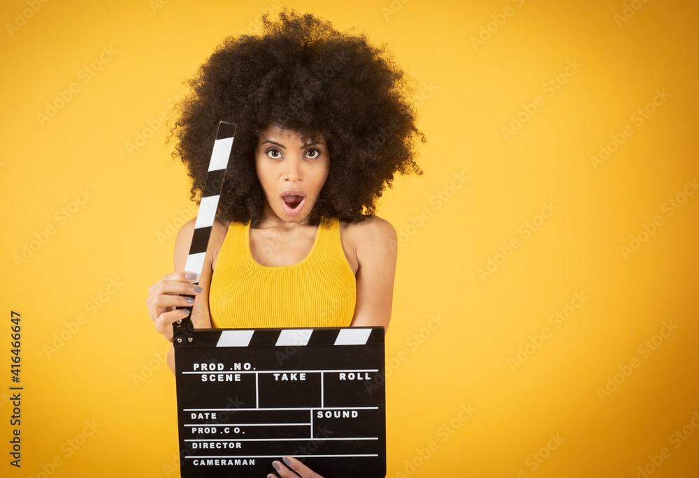 afro woman, movie buff, watching scary movie with scared face, yellow ...