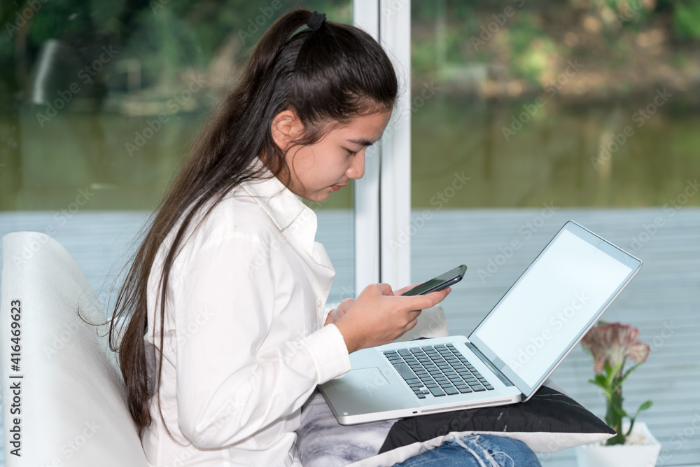 Education learning online concept, New normal style. Teen girl using ...