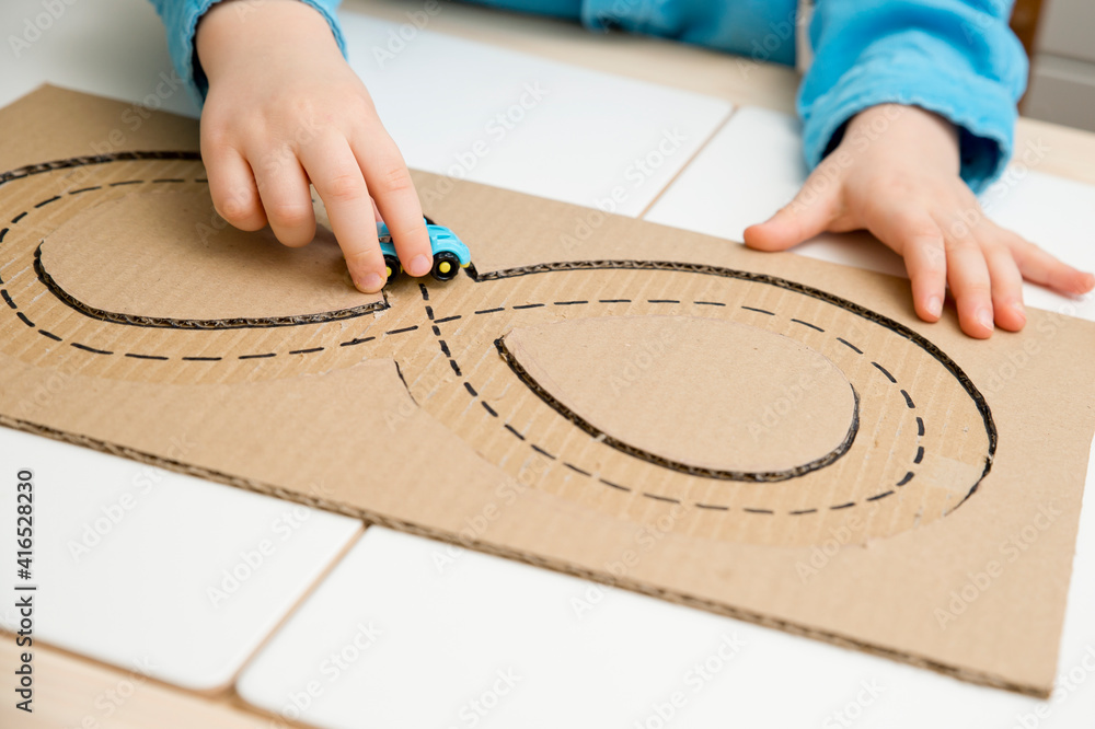 Corrugated carton race track. follow the lines. Implement for children ...