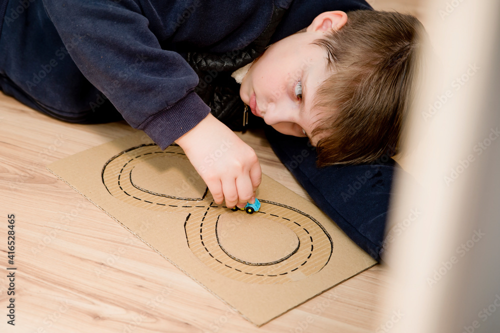 Corrugated carton race track. follow the lines. Implement for children ...