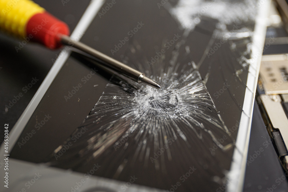 Screen cracked smartphone. Mobile phone with damaged touchscreen ...
