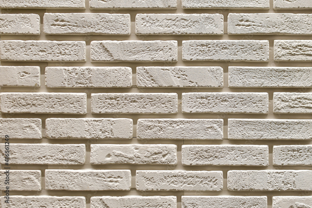 Textured beige brick wall, stone texture. decorative tiles for wall ...