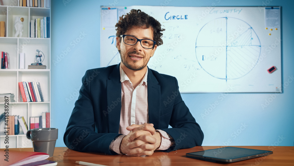 Online e-Education: Teacher Sitting at Desk, Explains Lesson to a ...