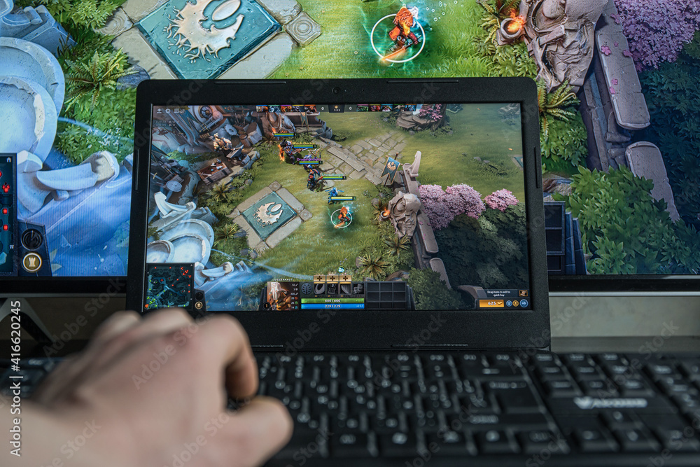 PC gaming. Playing DOTA 2 video game on computer Stock Photo | Adobe Stock