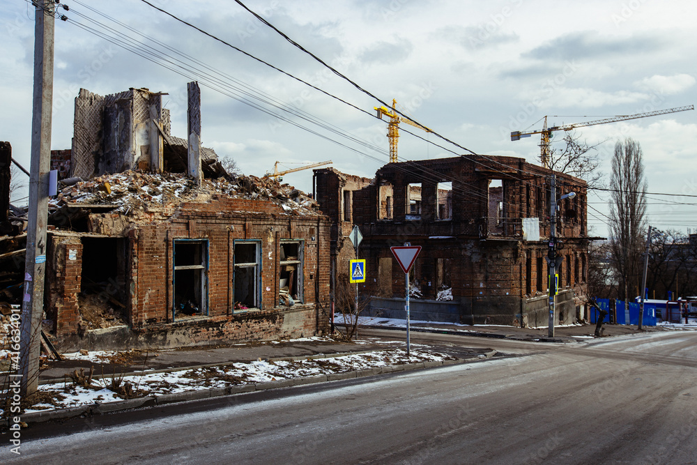 Ruined two-story brick buildings. Apocalypse, war, disaster concept ...