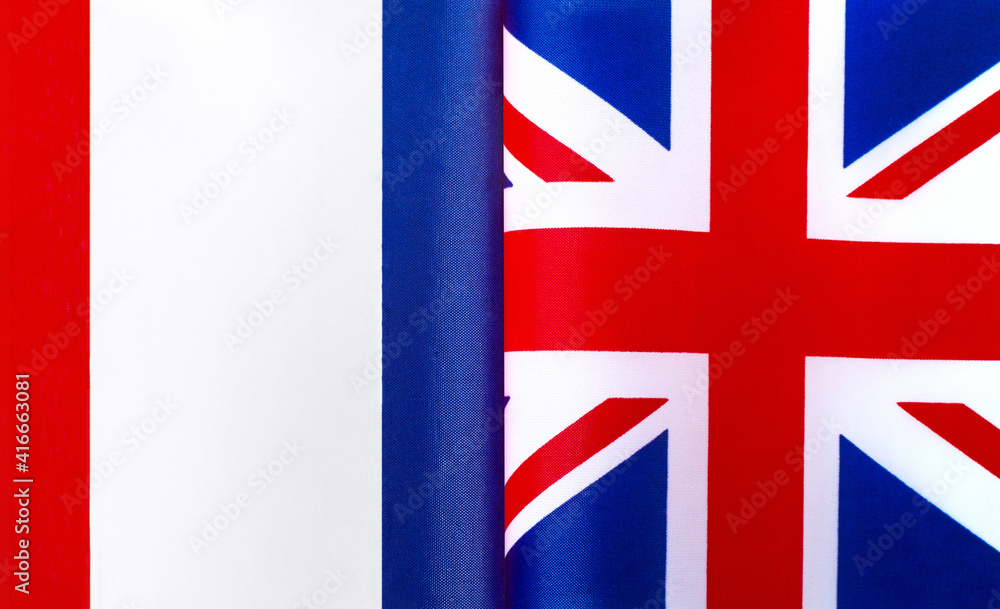fragments of the national flags of France and Great Britain close-up ...