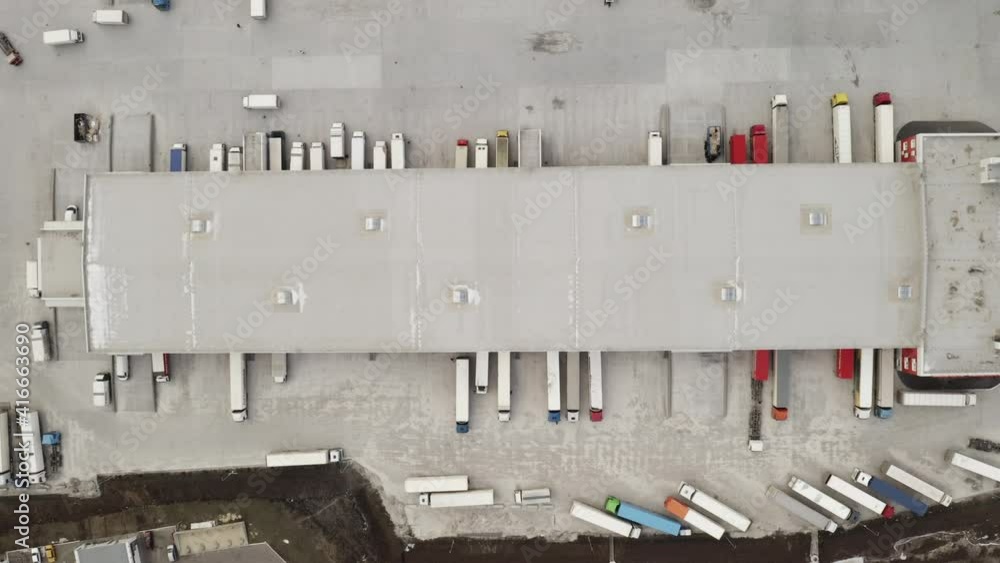The cargo terminal with waiting trucks and semi-trailers - aerial view ...