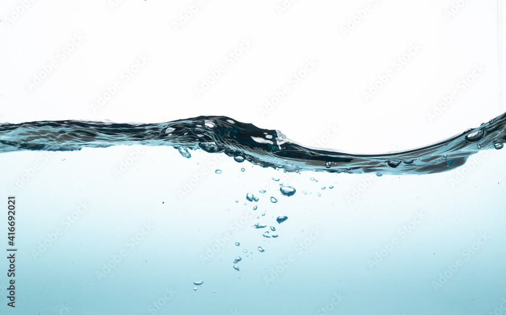 light blue water splash with bubbles of air, isolated on the white ...