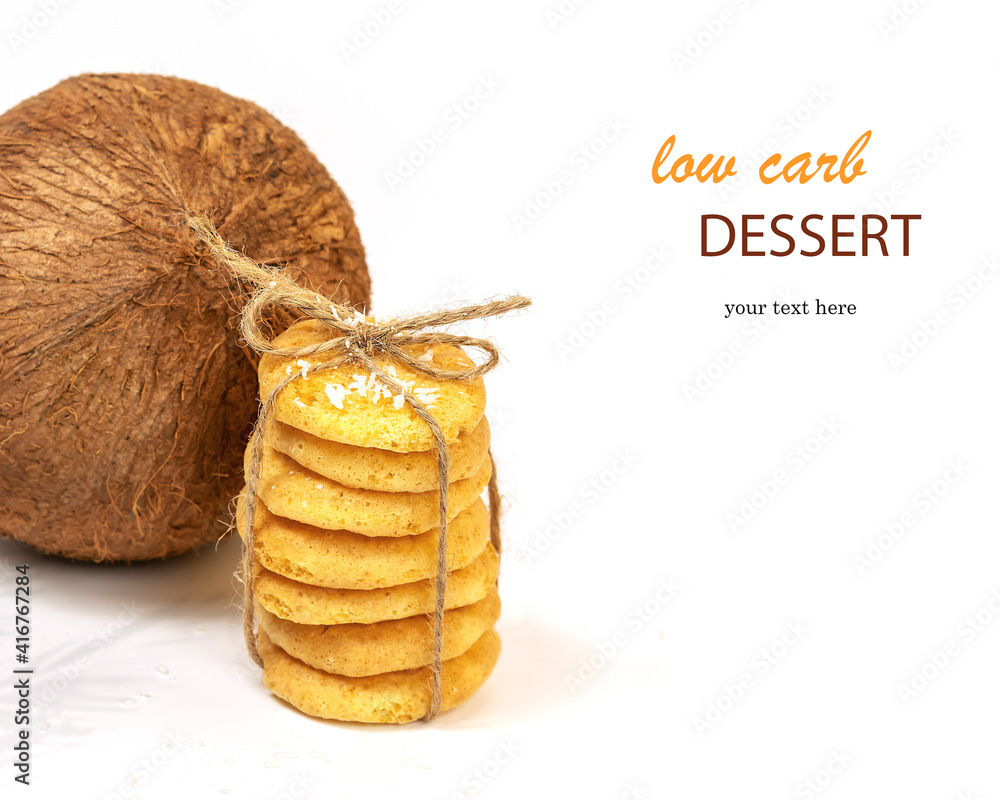 Homemade organic coconut cookies with a whole coconut on a white ...