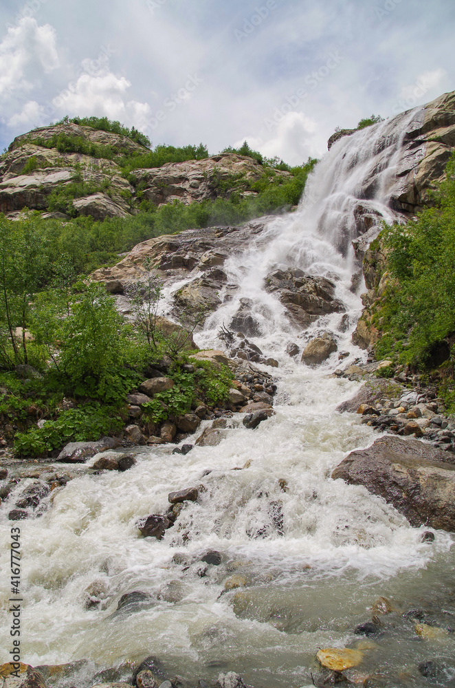 Dombay. Alibek Fall. Waterfall formed by falling of river from Alibek ...